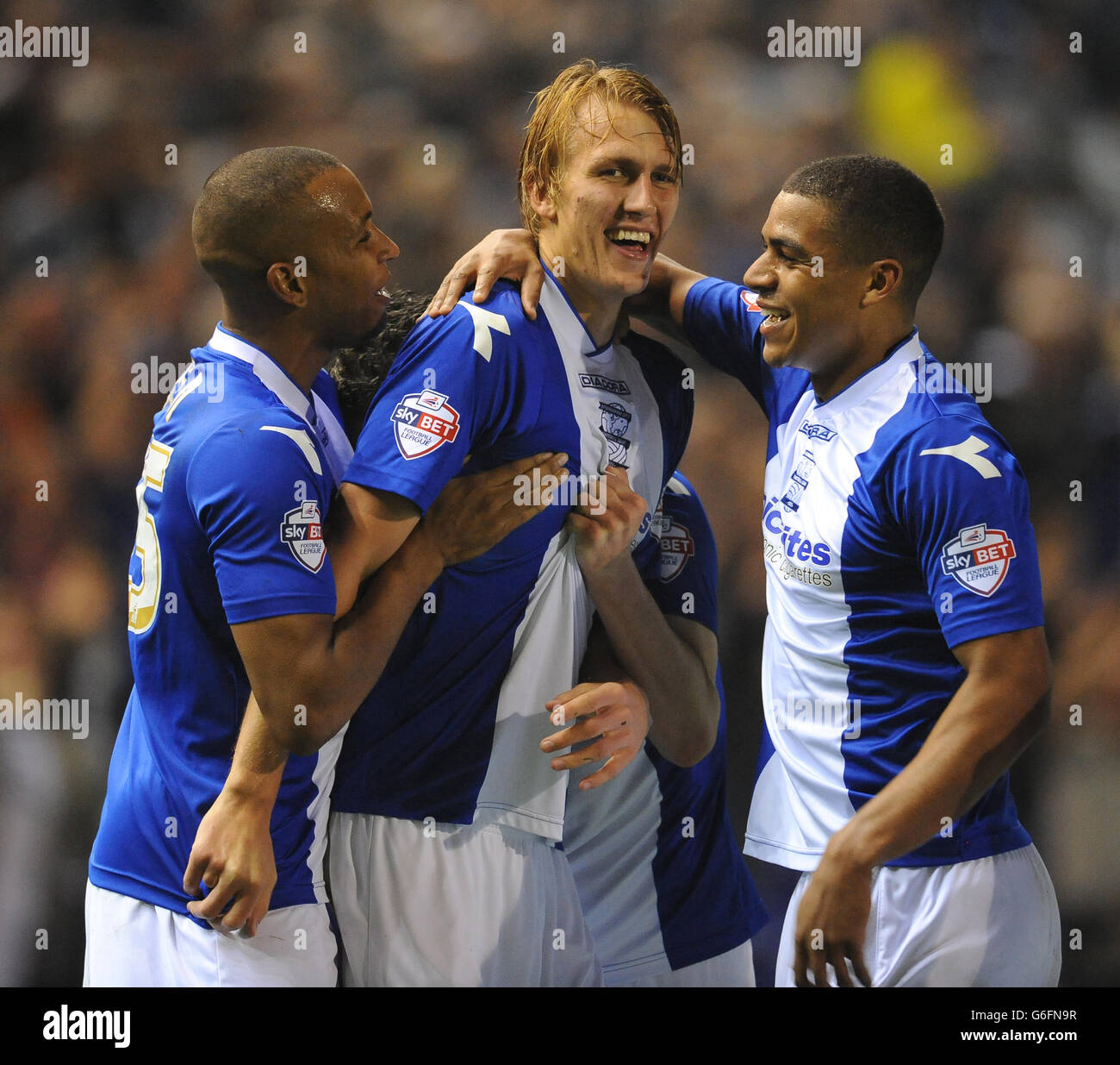 Birmingham City's Dan Burn (centre) celebrates with Matt Green (left ...