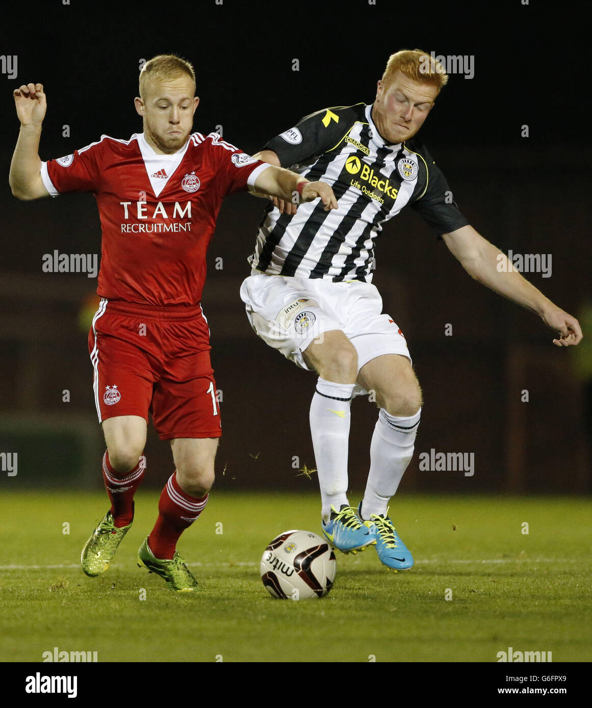 Aberdeen's Nicky Low and St Mirren's Conor Newton battle for the ball ...