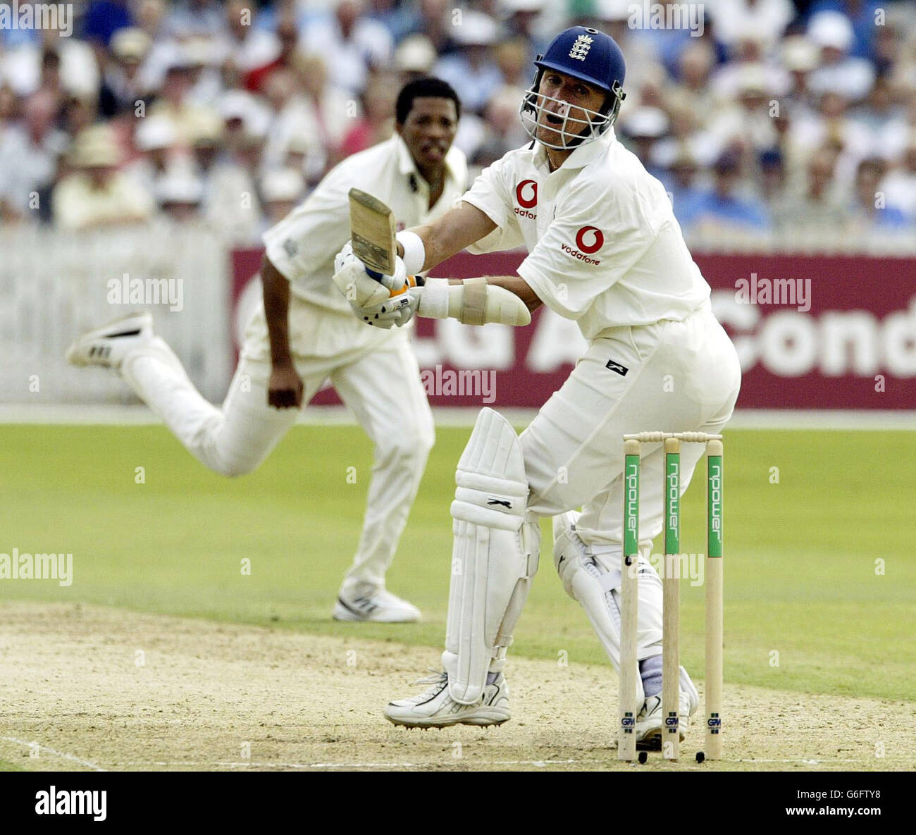 Englands alec stewart hooks south africas makhaya ntini left hi-res ...