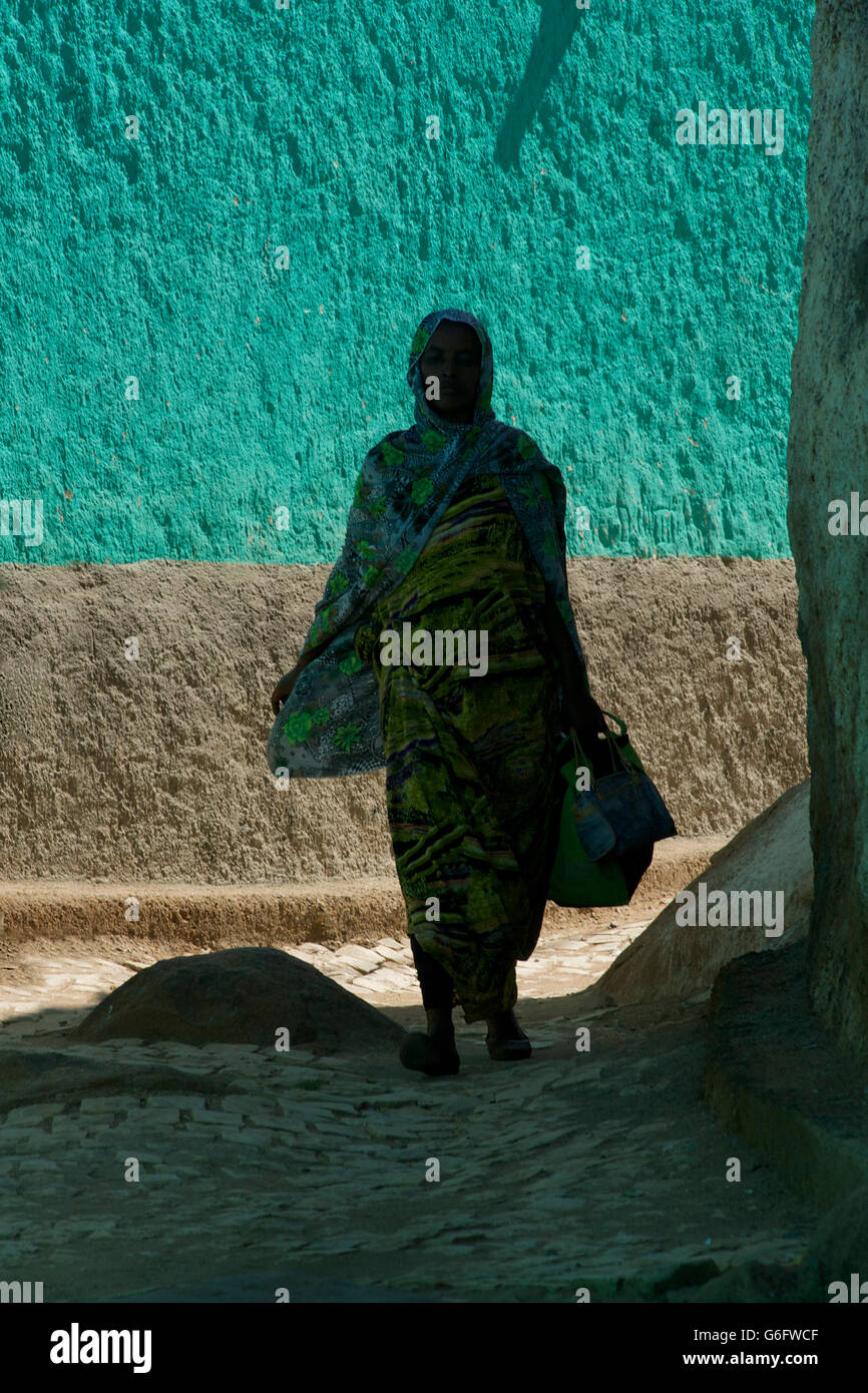 Ethiopian woman in muslim dress in the old quarter of Harar. Jugol ...