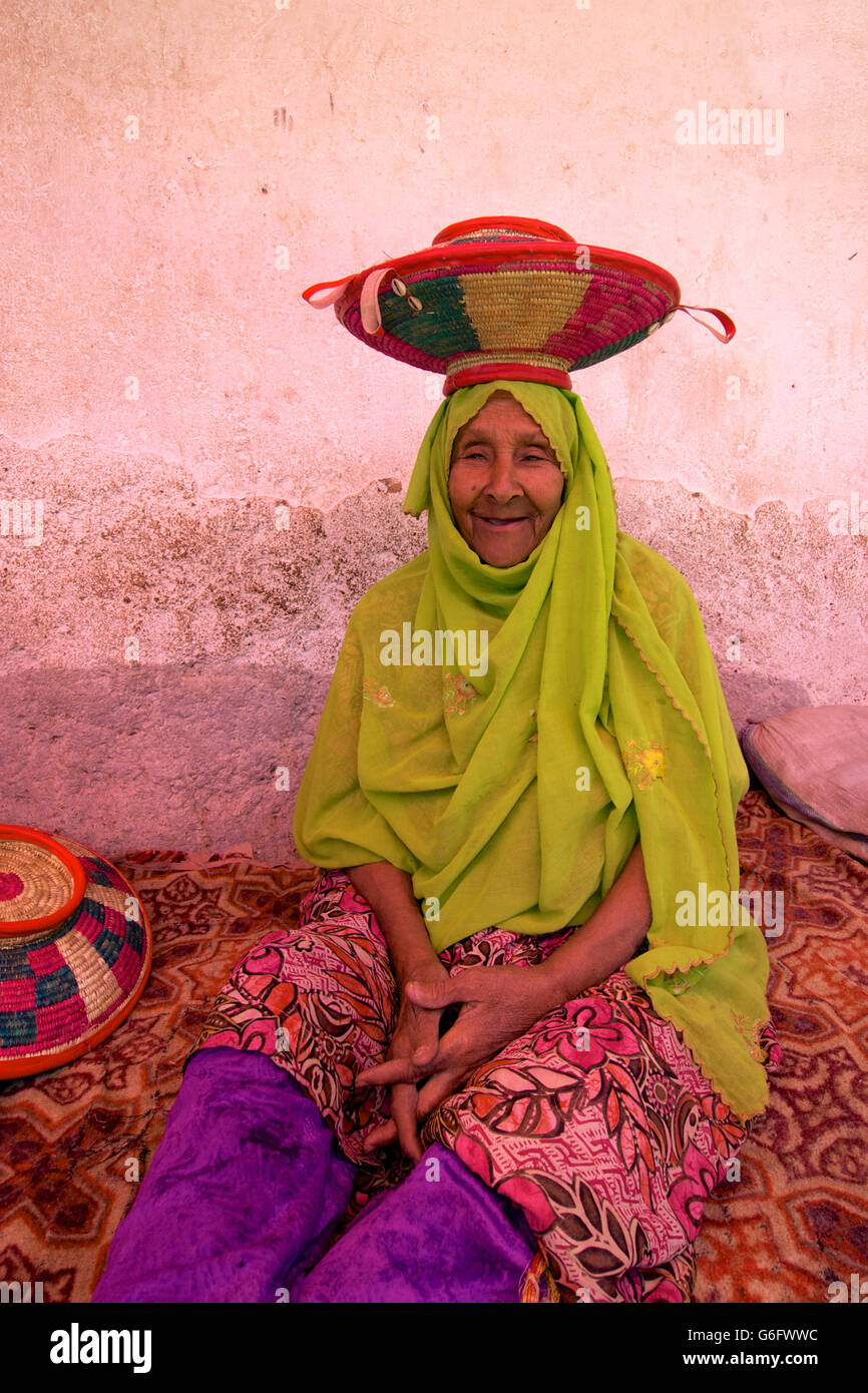 Harari woman at market with an injera basket on her head. Harar ...