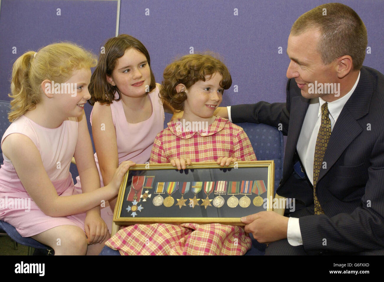 The Great-grand daughters of Captain Robert Garwood seated with ...