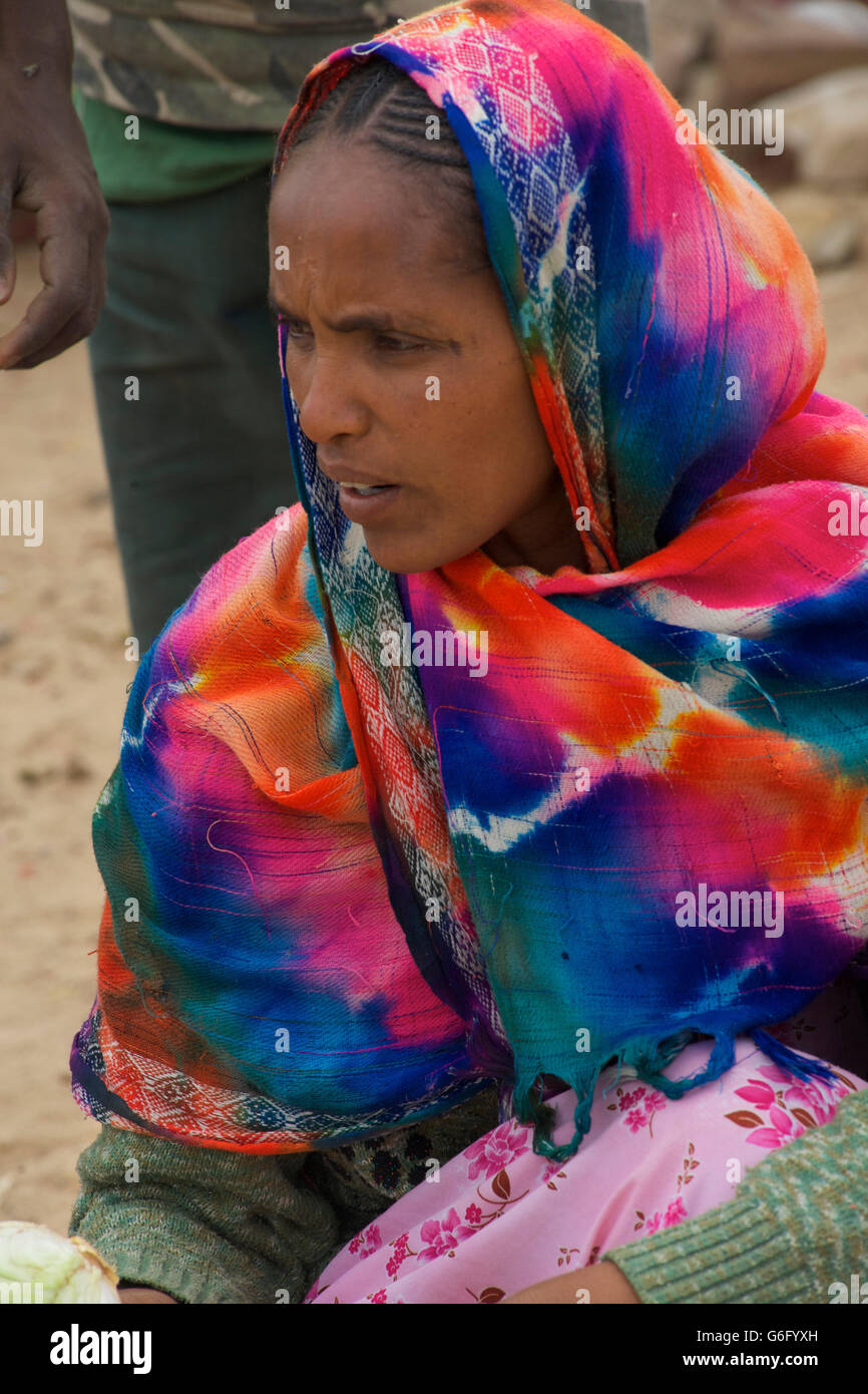 Ethiopian woman in colourful headscarf. Market day at Freweyni also ...
