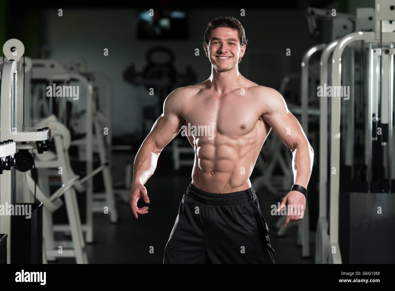 Bodybuilder Posing In Different Poses Demonstrating Their Muscles ...
