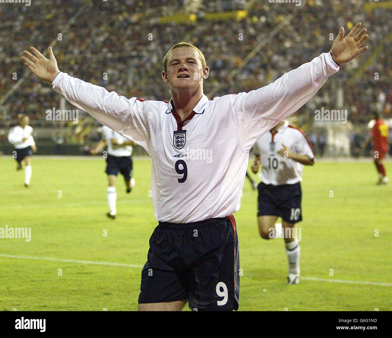 England's Wayne Rooney celebrates scoring against Macedonia during ...