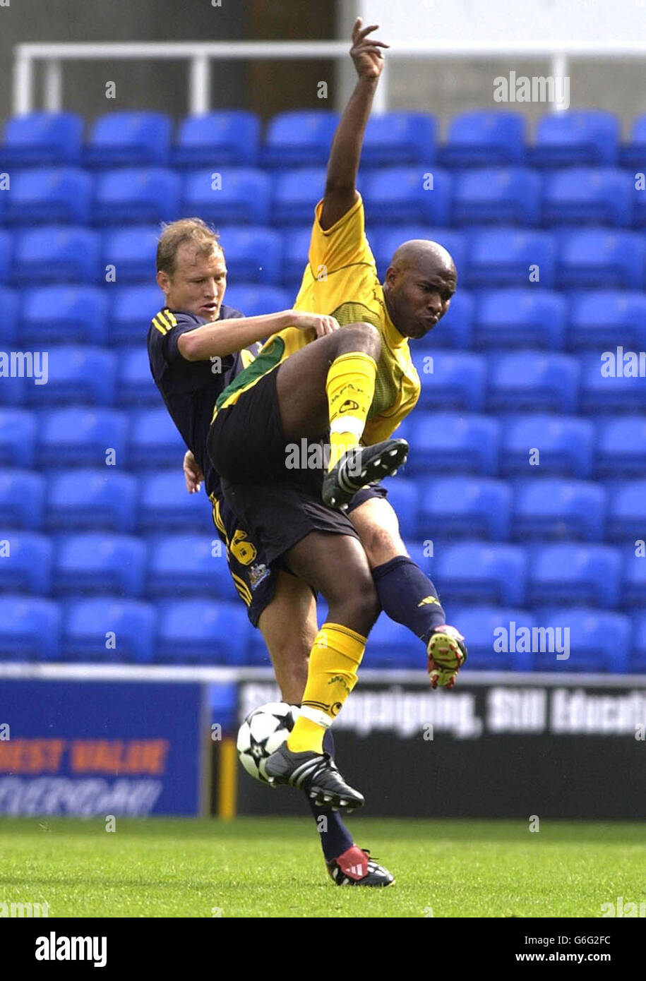 Jamaica's Barry Hayles tussles with Steve Laybutt during the ...