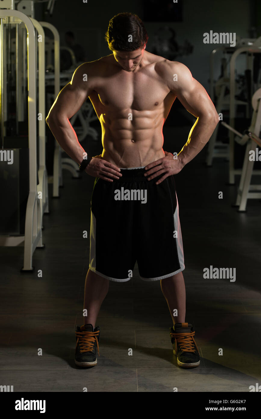 Bodybuilder Posing In Different Poses Demonstrating Their Muscles ...