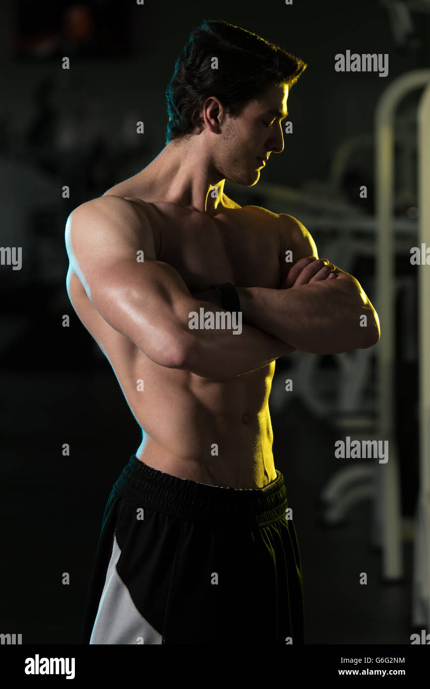 Bodybuilder Posing In Different Poses Demonstrating Their Muscles ...