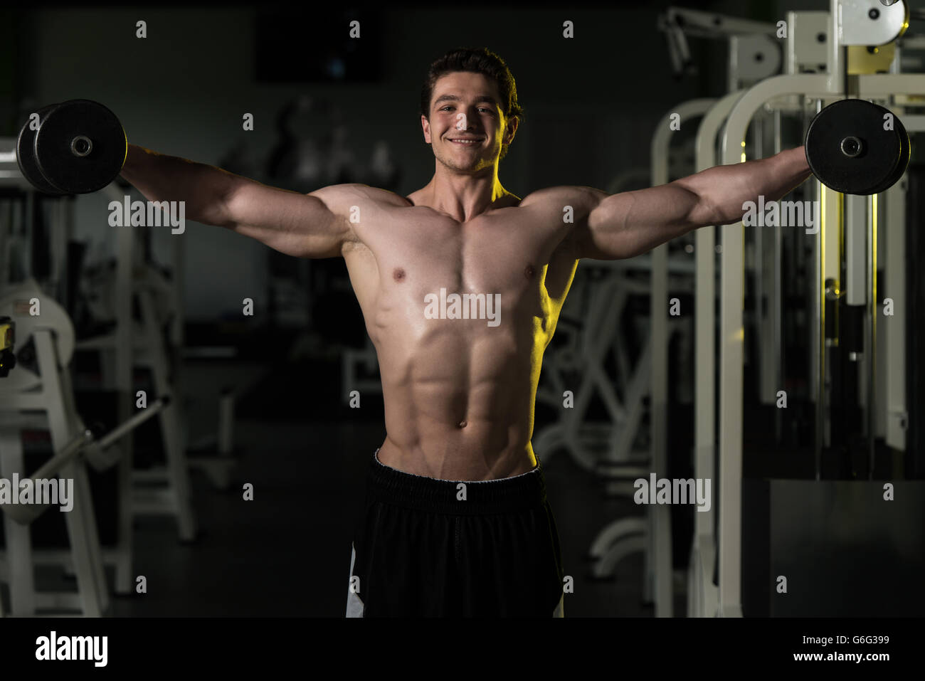 Man doing fitness exercise shoulders hi-res stock photography and ...