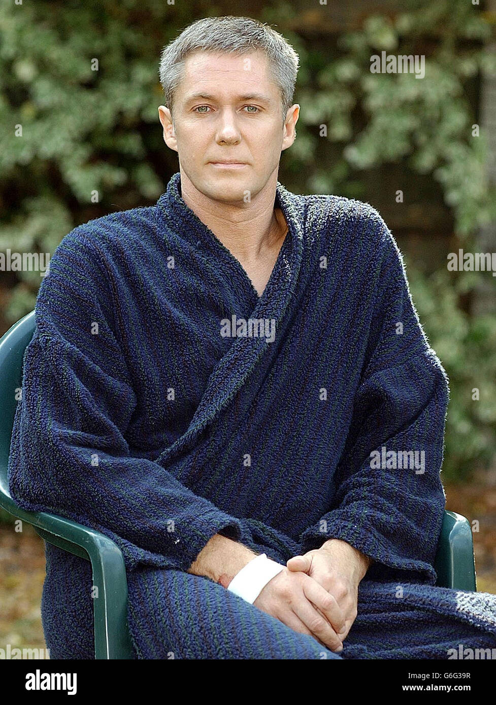 Pharmacist Stewart Evans, 38, in his garden in Southgate, north London ...