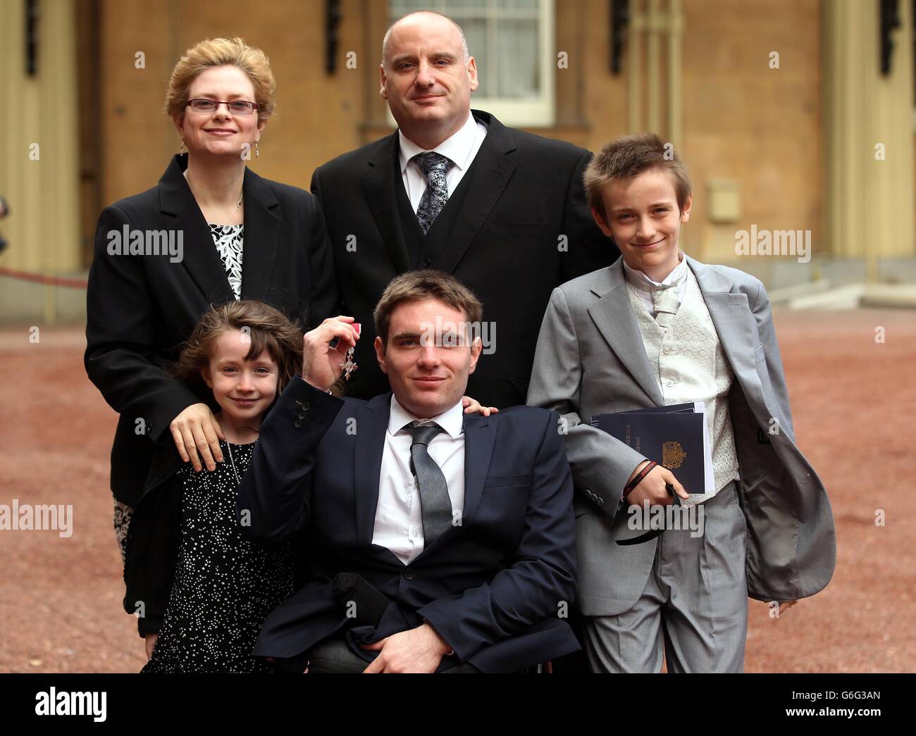 Wheelchair Athlete Michael Bushell poses with family members (names not ...