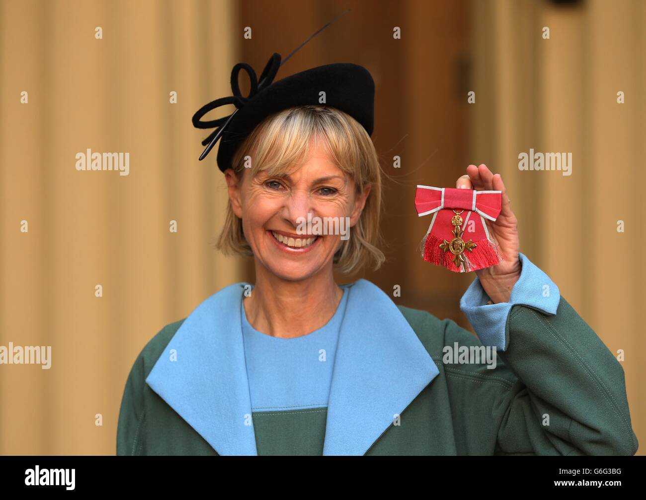 Author Kate Mosse poses with her medal after being made an Officer of ...
