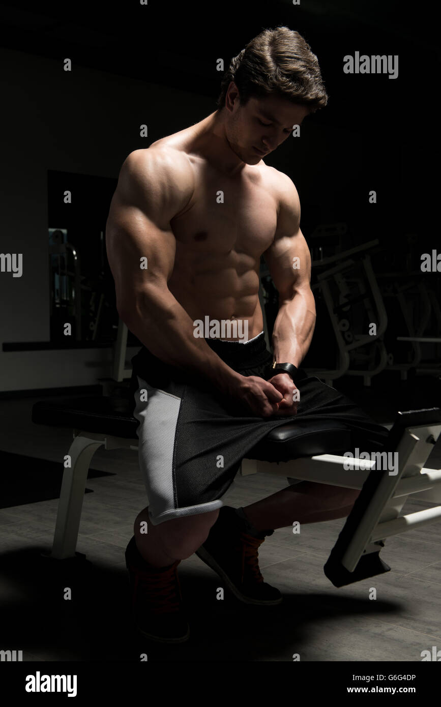 Good Looking And Attractive Young Man With Muscular Body Sitting On ...
