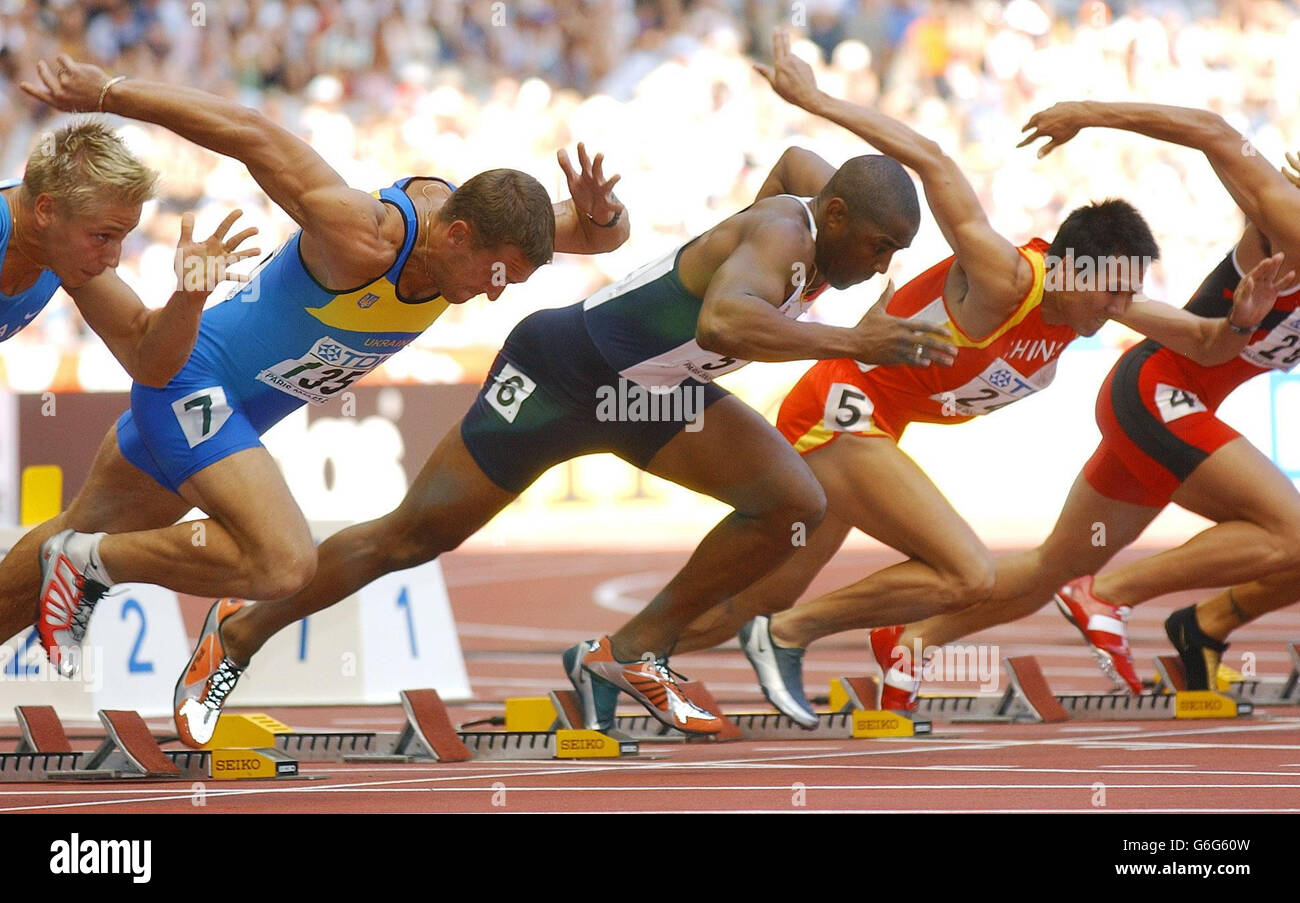 Darren Campbell of Great Britain (no 6) gets a great start to go on and ...