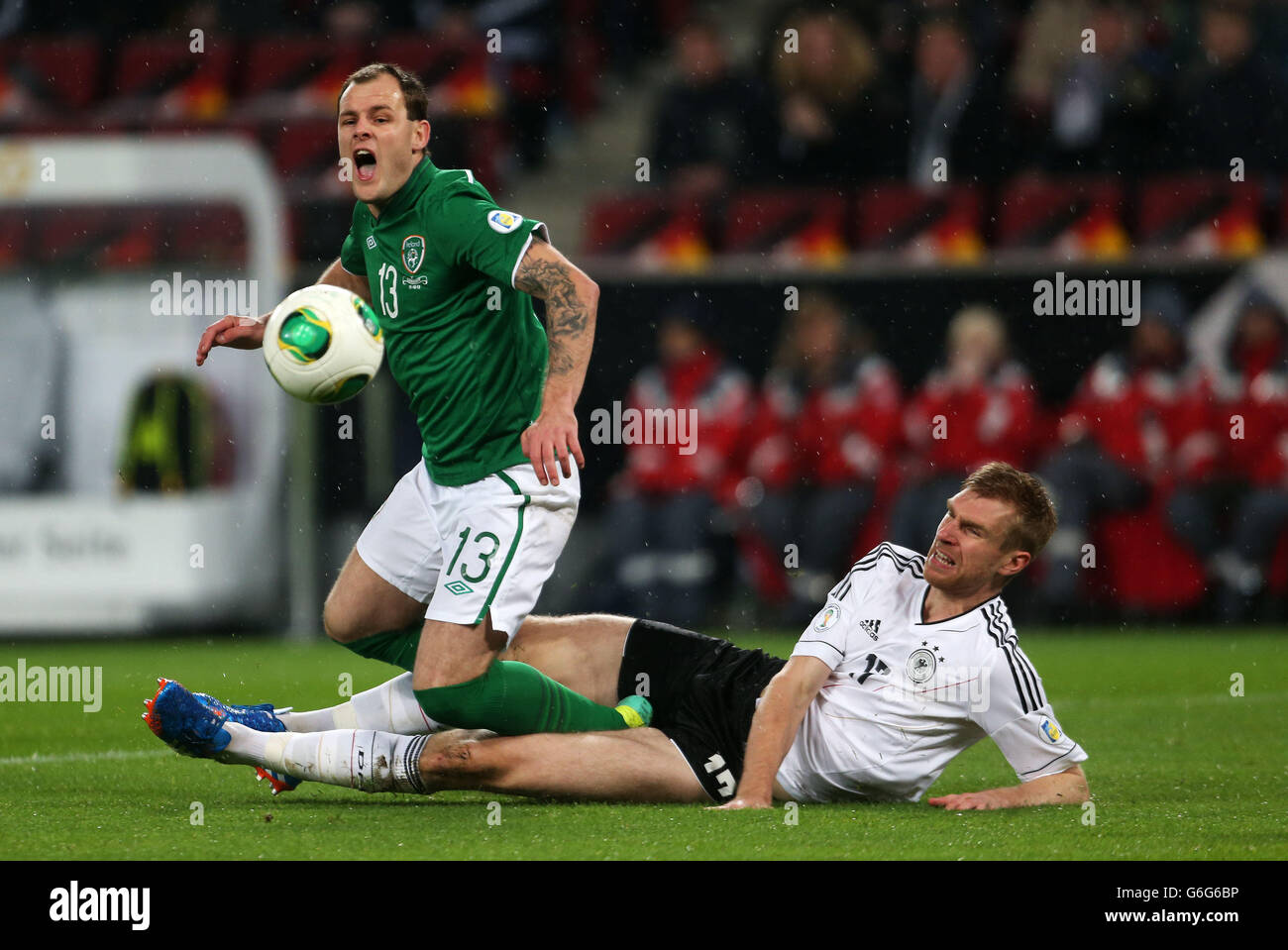 Republic of Ireland's Anthony Stokes and Germany's Per Mertesacker ...