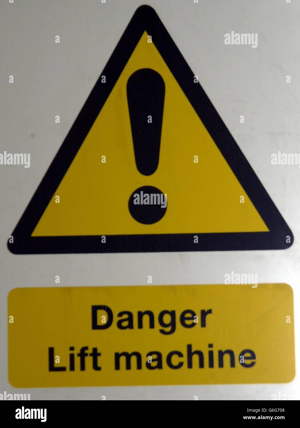 Danger lift machine sign Stock Photo - Alamy