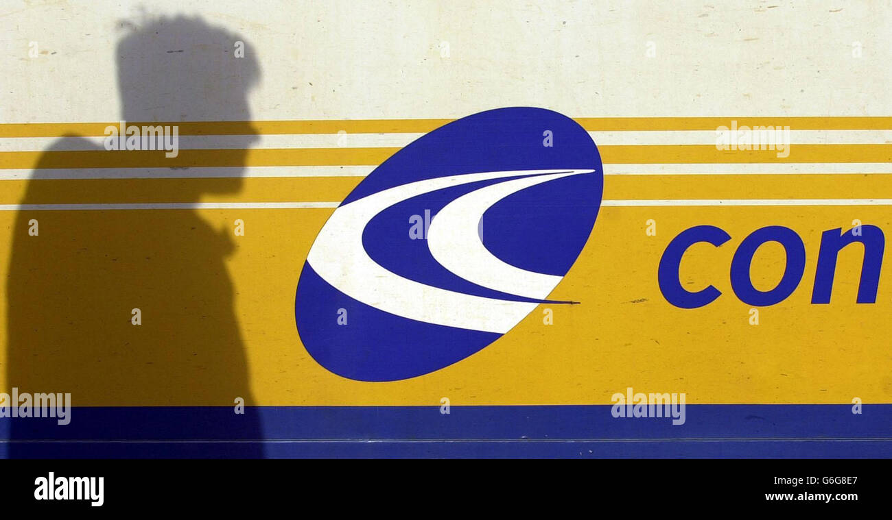 Passengers prepare to board a Connex train at Ashford Station in Kent ...