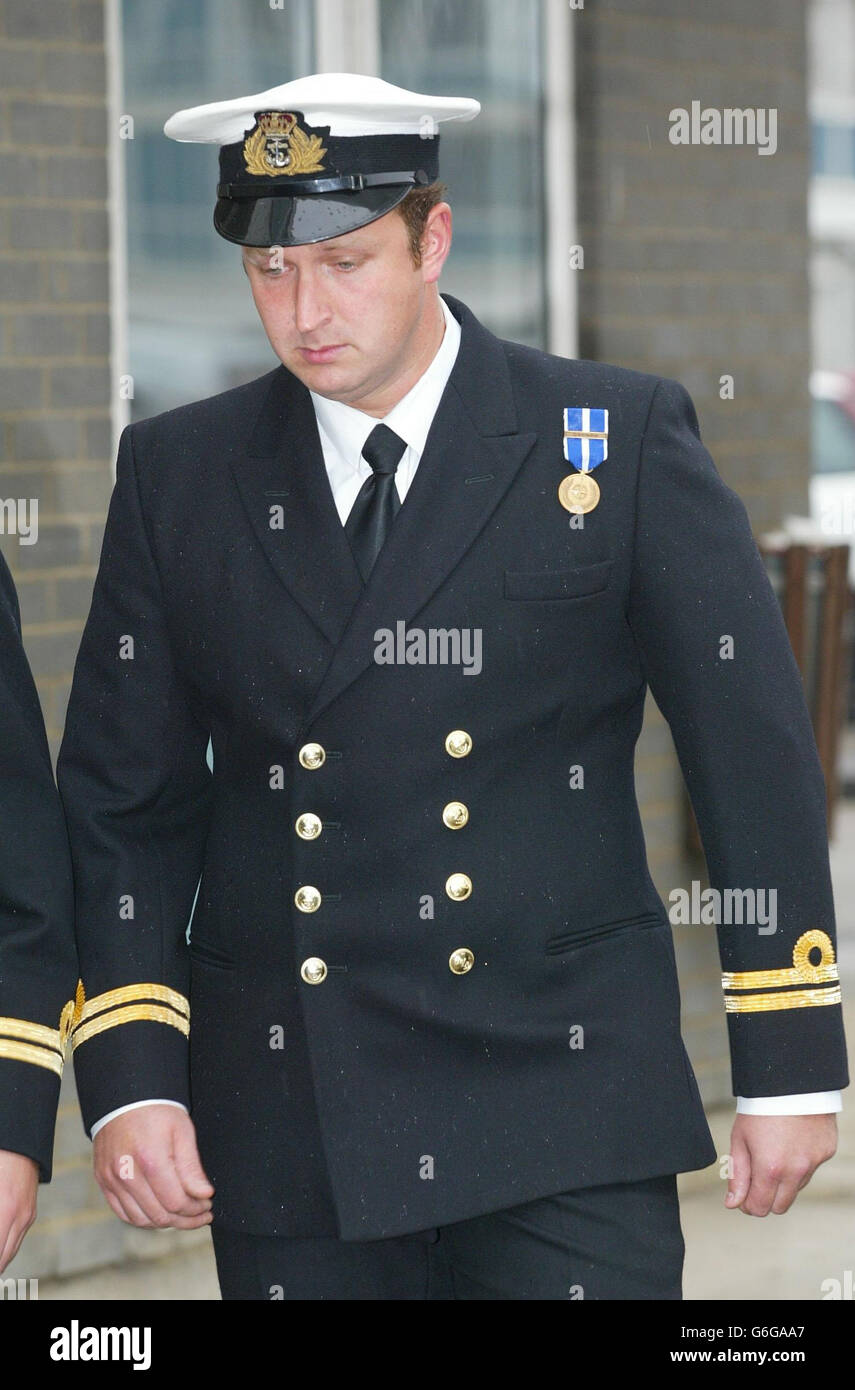 Royal Navy Lieutenant James Denney arrives at a Court Martial in ...