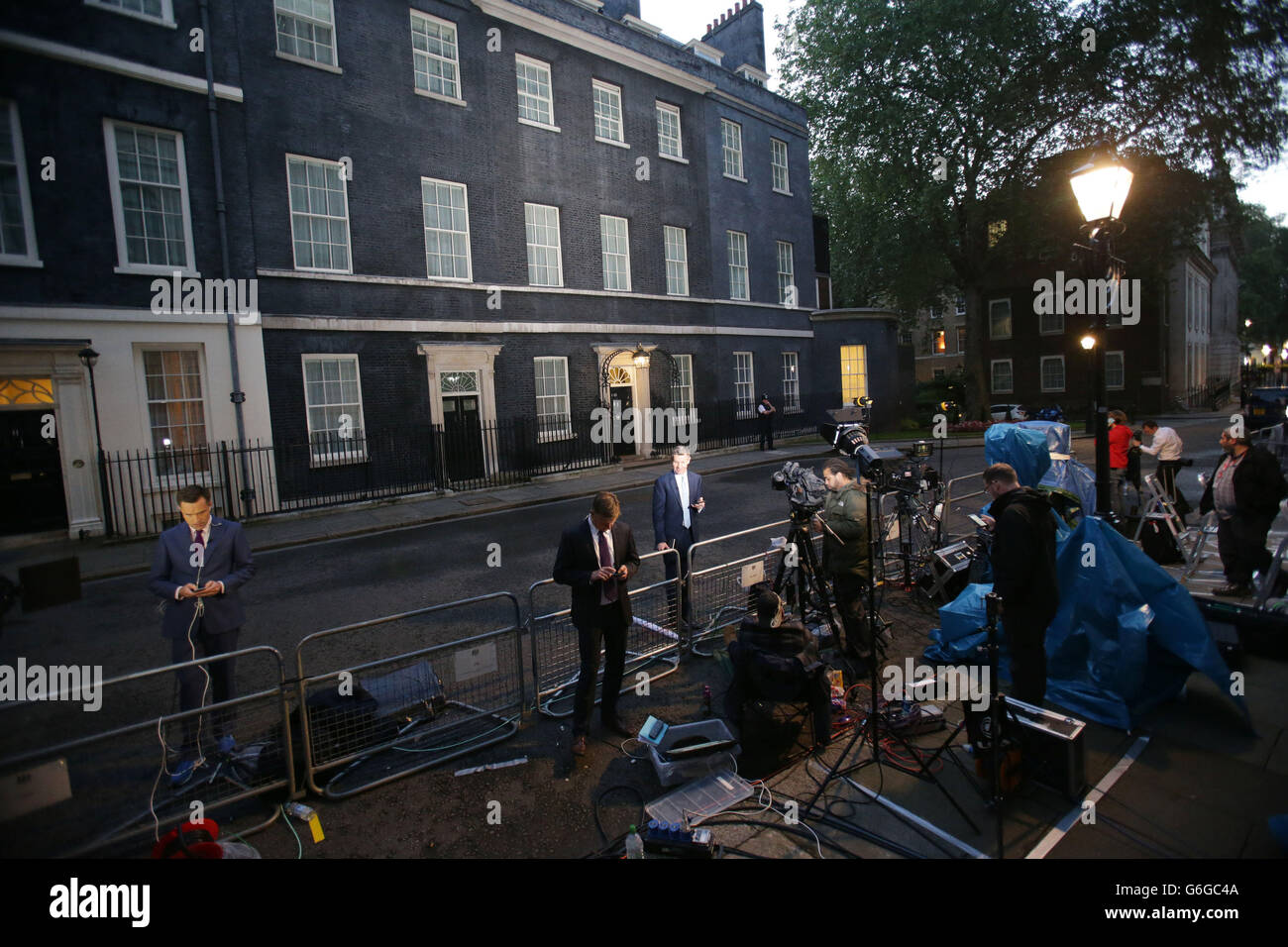 Journalists outside 10 Downing Street, the official residence of the ...