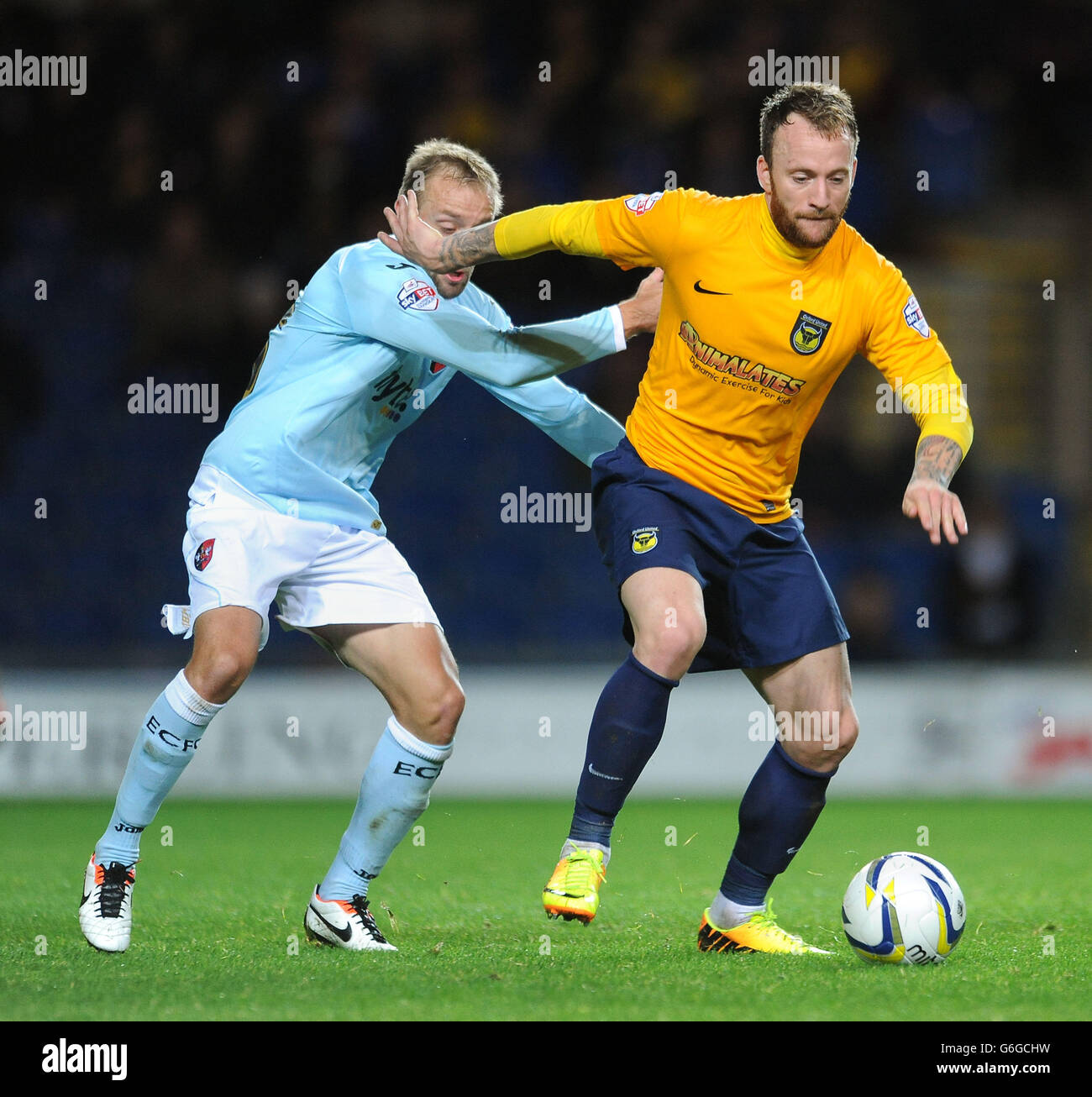 Oxford United's Sean Rigg (right) and Exeter City's Matthew Gill (left ...