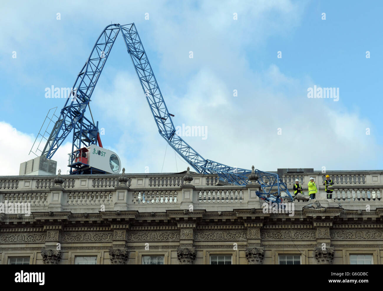 A collapsed crane on the roof of the Cabinet Office, central London, as ...