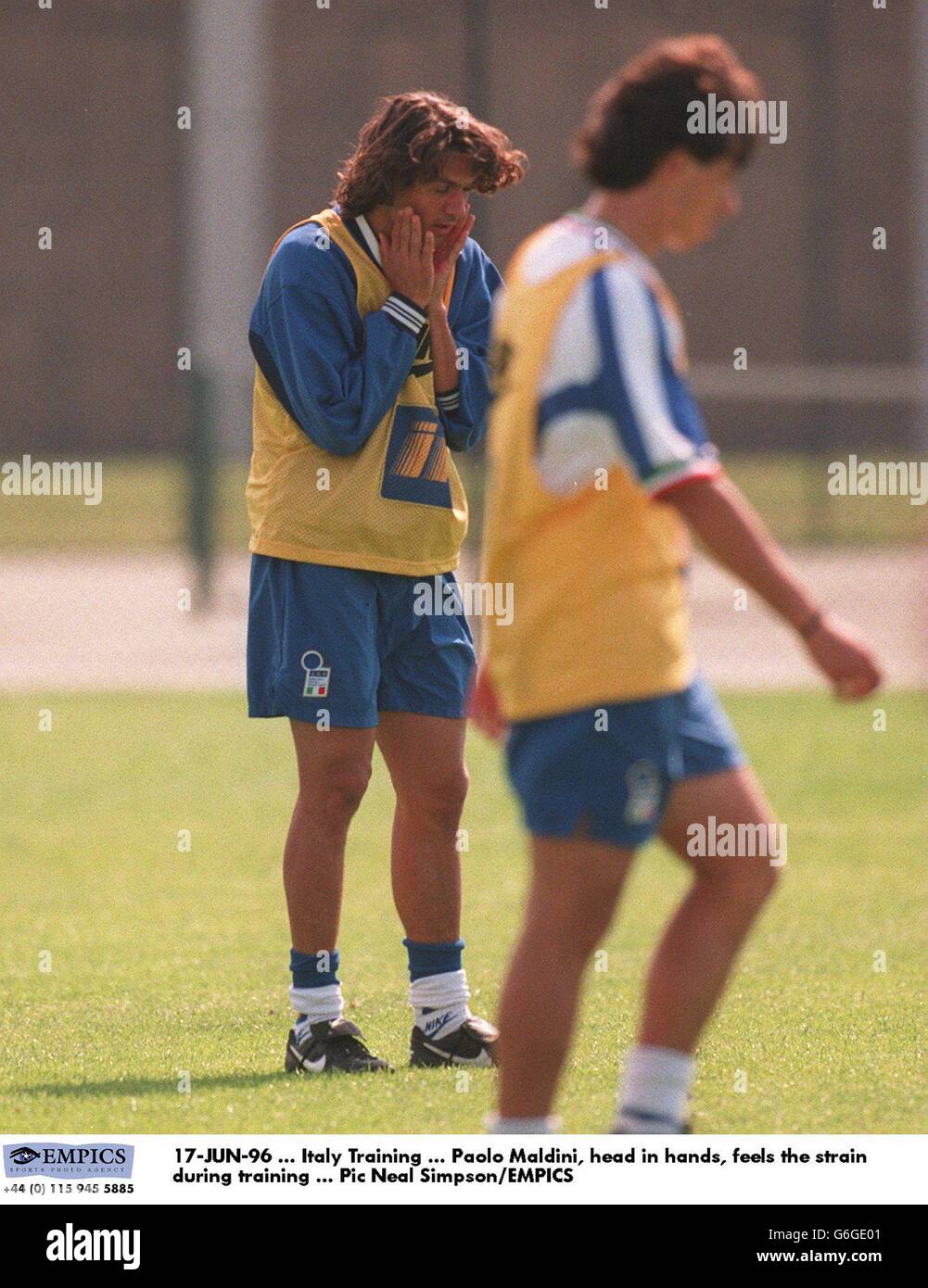 Paolo Maldini, head in hands, feels the strain during training Stock ...