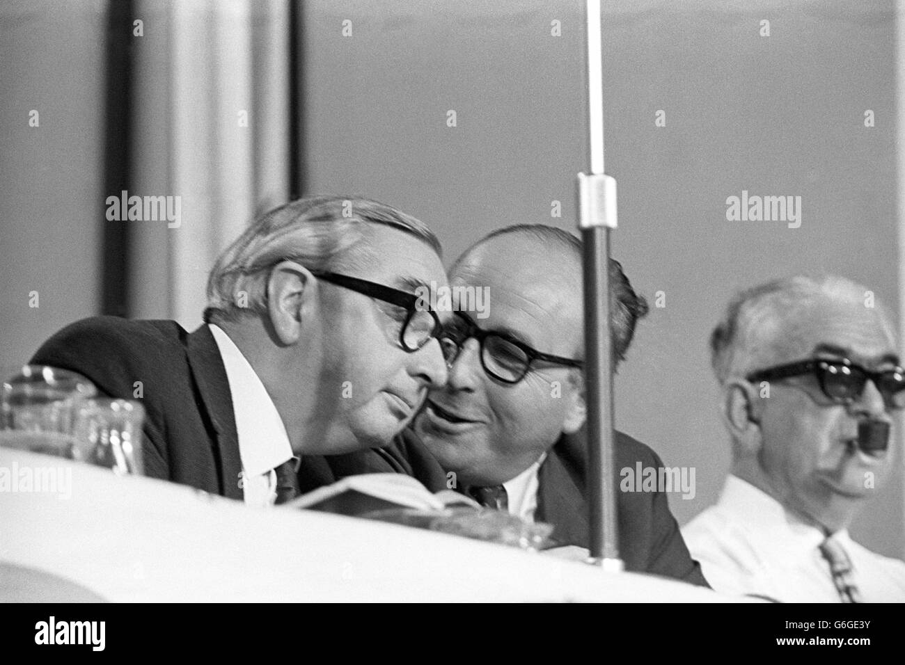 George Brown (left), Deputy Leader of the Labour Party, listens to ...