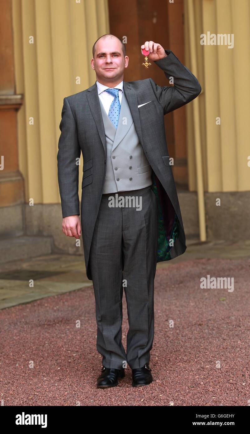 John gilhooly with his obe at buckingham palace hi-res stock ...