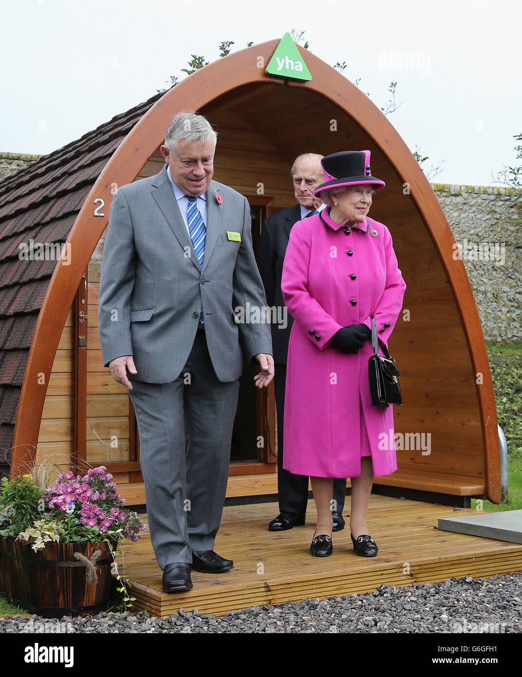 Queen Elizabeth II and the Duke of Edinburgh (behind) view 'Glamping ...