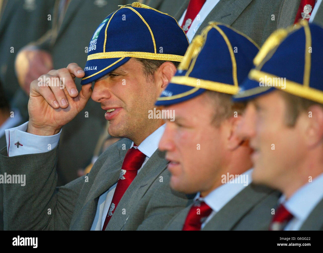 England's captain, Martin Johnson, touches the peak of his Rugby World ...