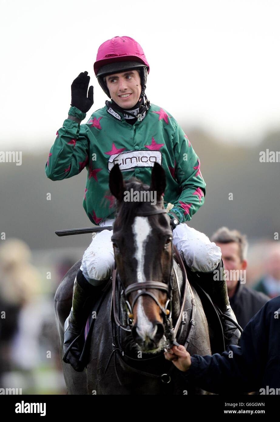 Jockey Dominic Elsworth acknowledges the crowd after victory on ...
