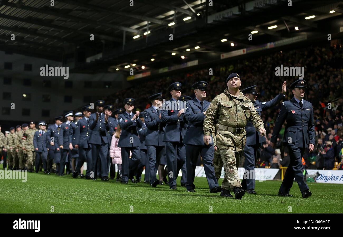 Soldiers parade around Crrow Road at half-time ahead of Remembrance ...