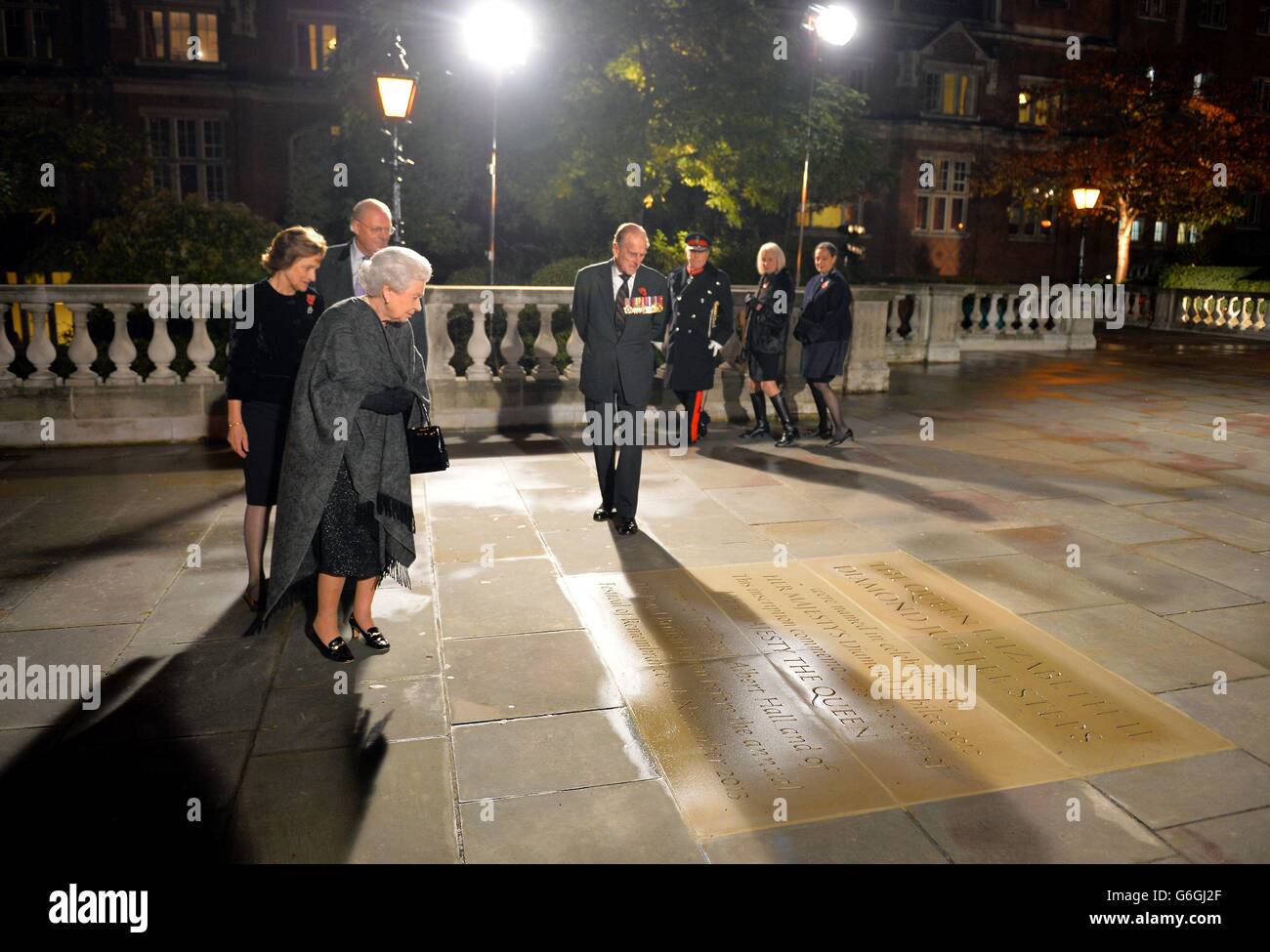 Queen Elizabeth II and the Duke of Edinburgh view the plaque ...