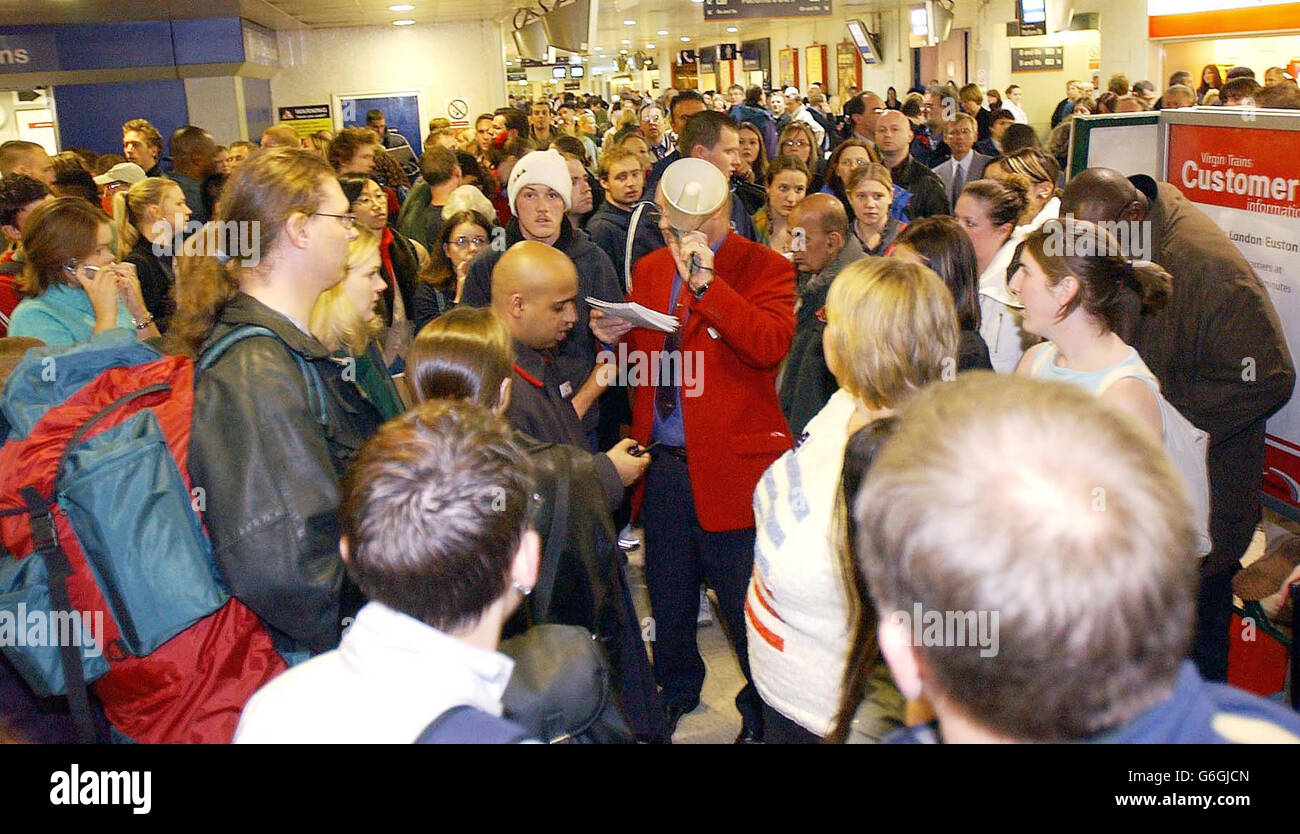 Megaphone announcement to waiting commuters after train service is ...