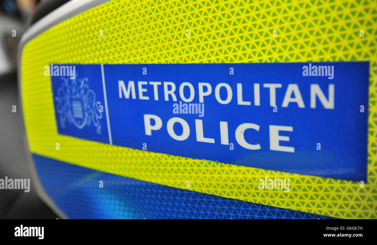 General view of a Metropolitan Police sign on the side of a BMW London ...