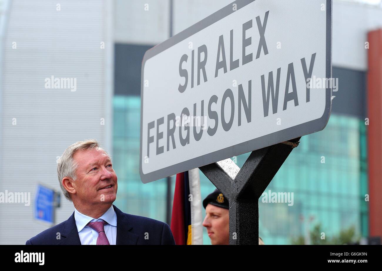 Sir Alex Ferguson unveils the street sign during a ceremony to mark the ...