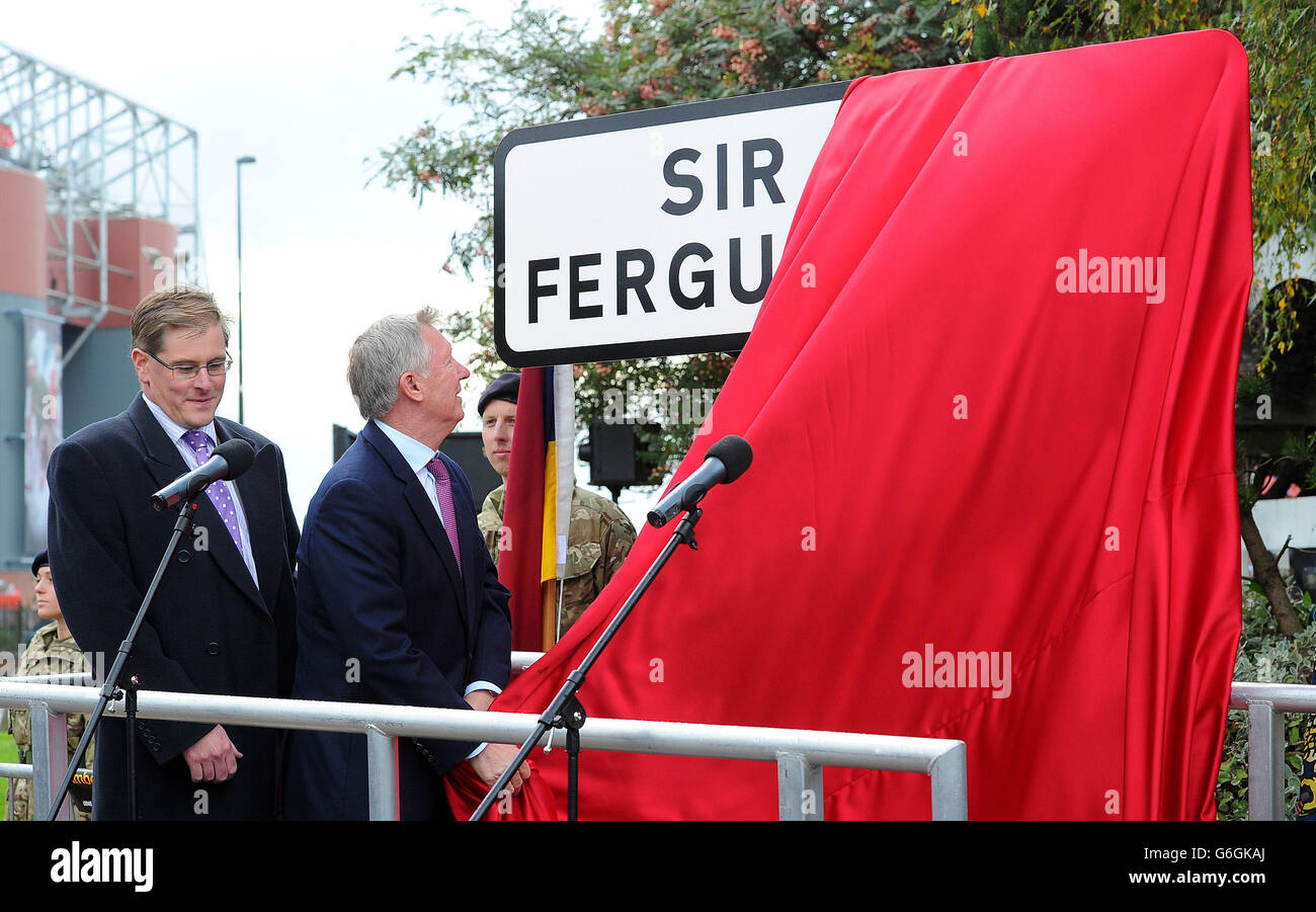 Sir Alex Ferguson unveils the street sign during a ceremony to mark the ...