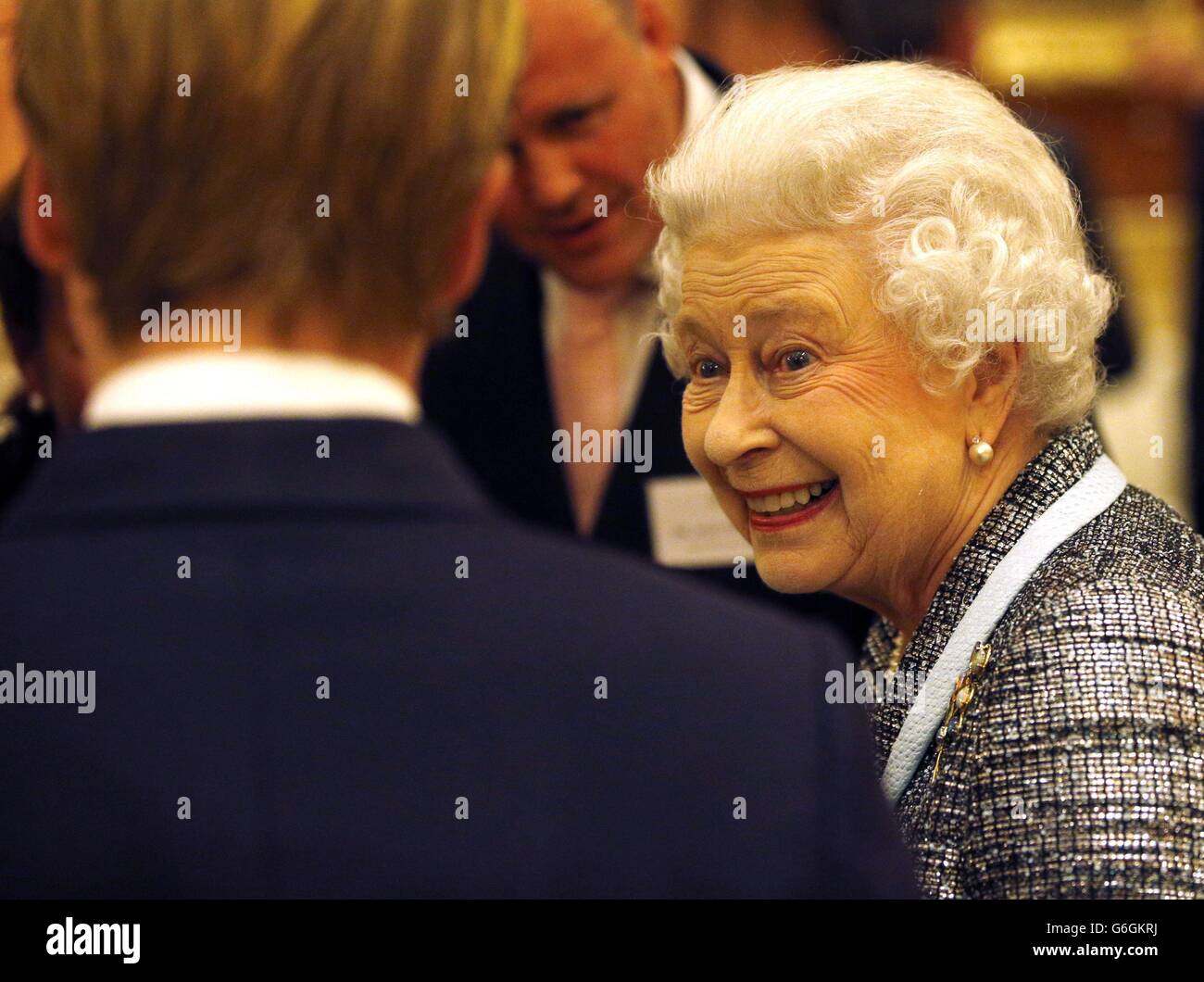 Queen Elizabeth II greets a guest during a reception held at Buckingham ...
