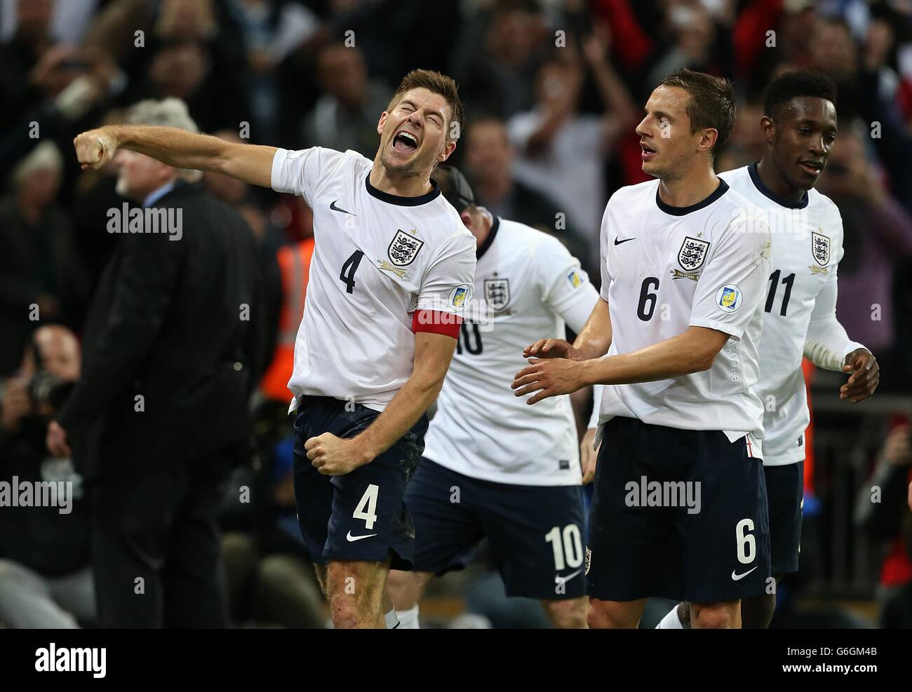 England's Steven Gerrard celebrates scoring his side's second goal ...