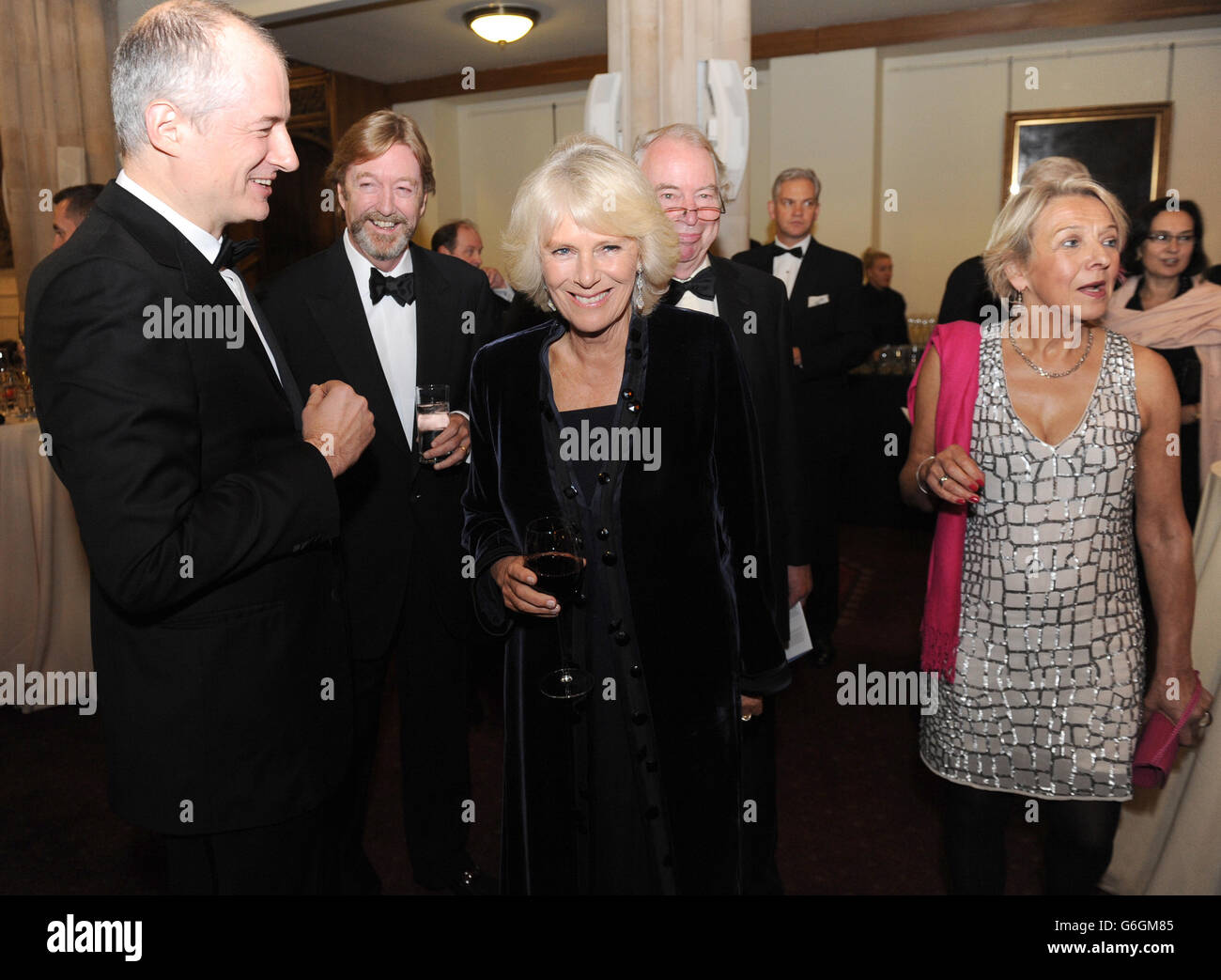 The Duchess of Cornwall (centre) arrives for a reception with Emmanuel ...