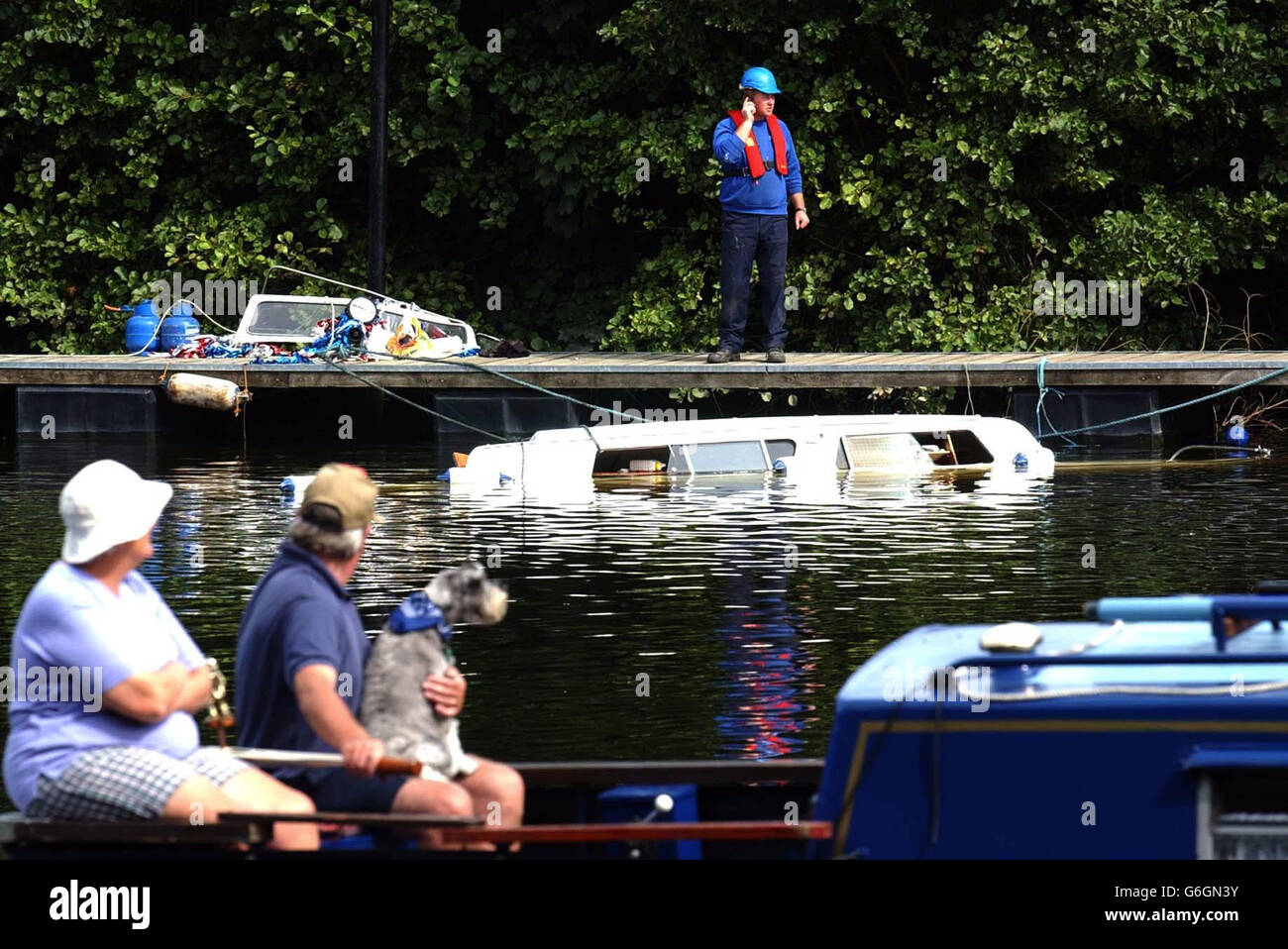 Capsized pleasure boat Stock Photo - Alamy