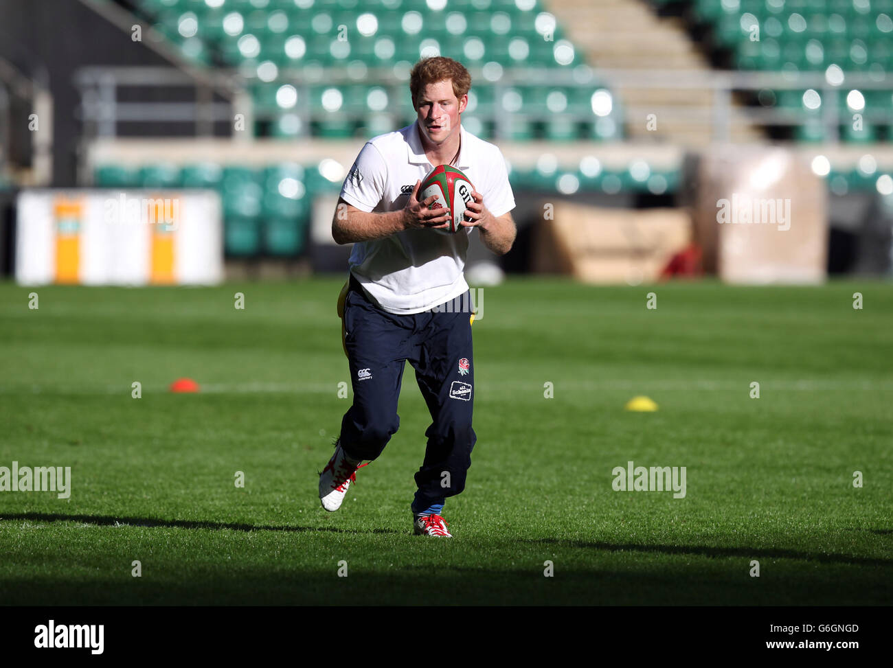 Prince Harry rugby coaching session Stock Photo - Alamy