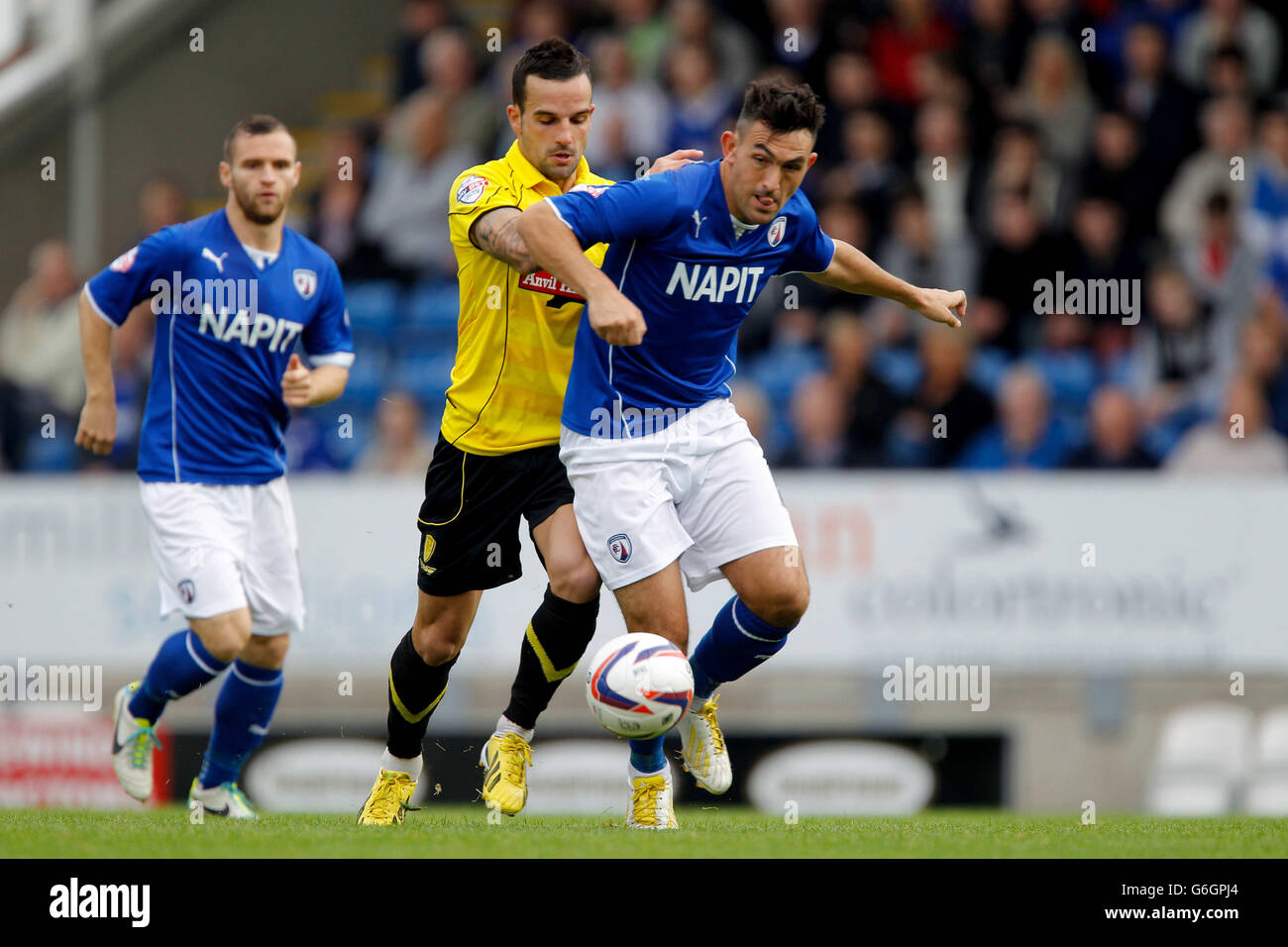 Chesterfield's Gary Roberts (right) and Burton Albion's Robbie Weir in ...