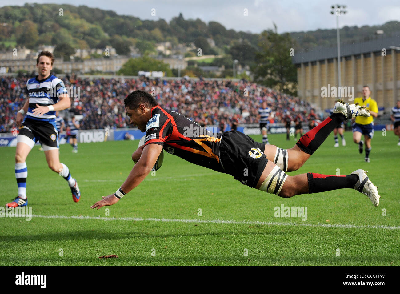 Newport Gwent Dragon's Toby Faletau scores a try during the Amlin ...