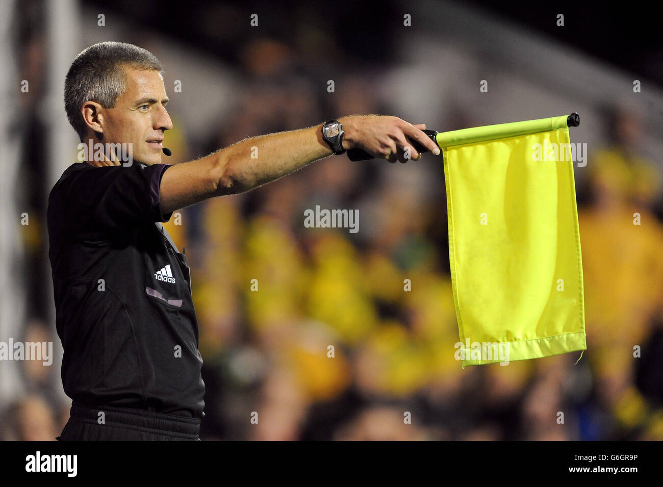 Assistant referee signals for offside hi-res stock photography and ...