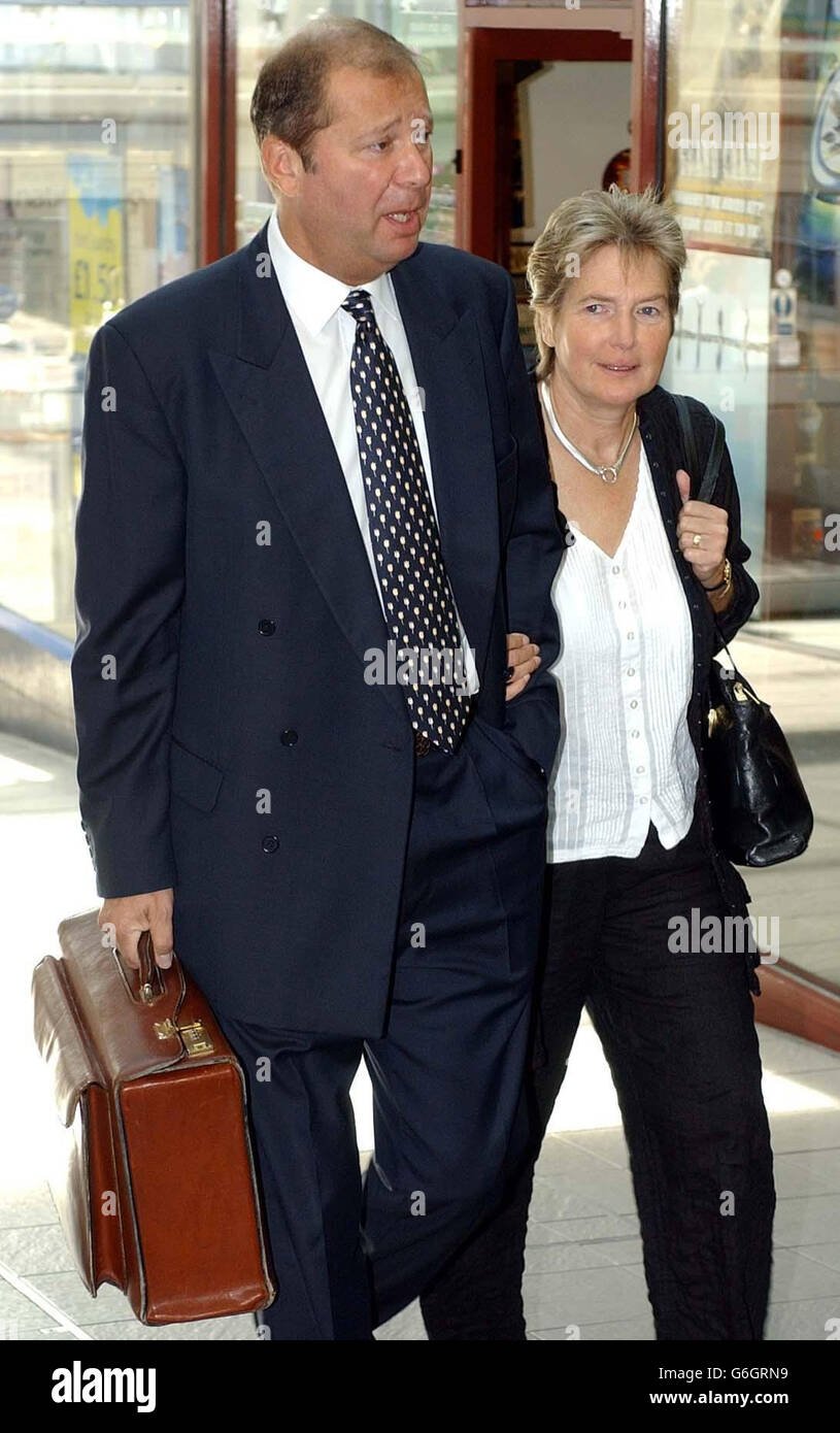 Former BBC News presenter Laurie Mayer arrives with his wife Gill at ...