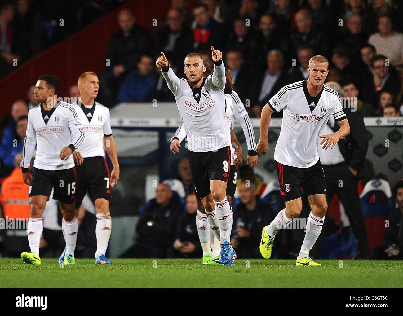Fulham's Pajtim Kasami (centre) celebrates after scoring his team's ...