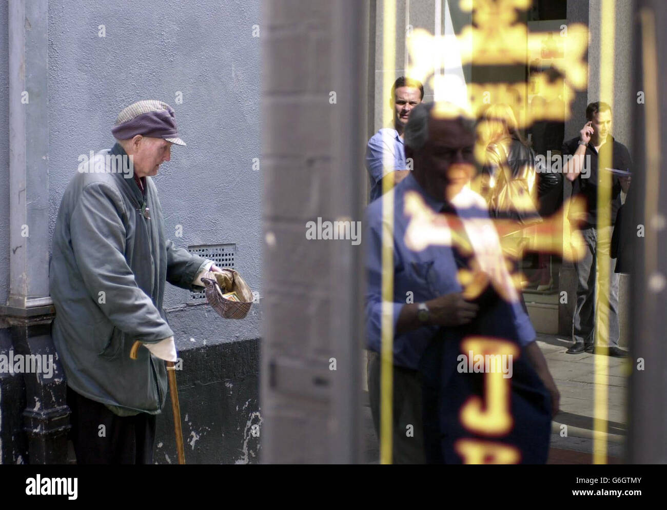 Rich man begs hi-res stock photography and images - Alamy