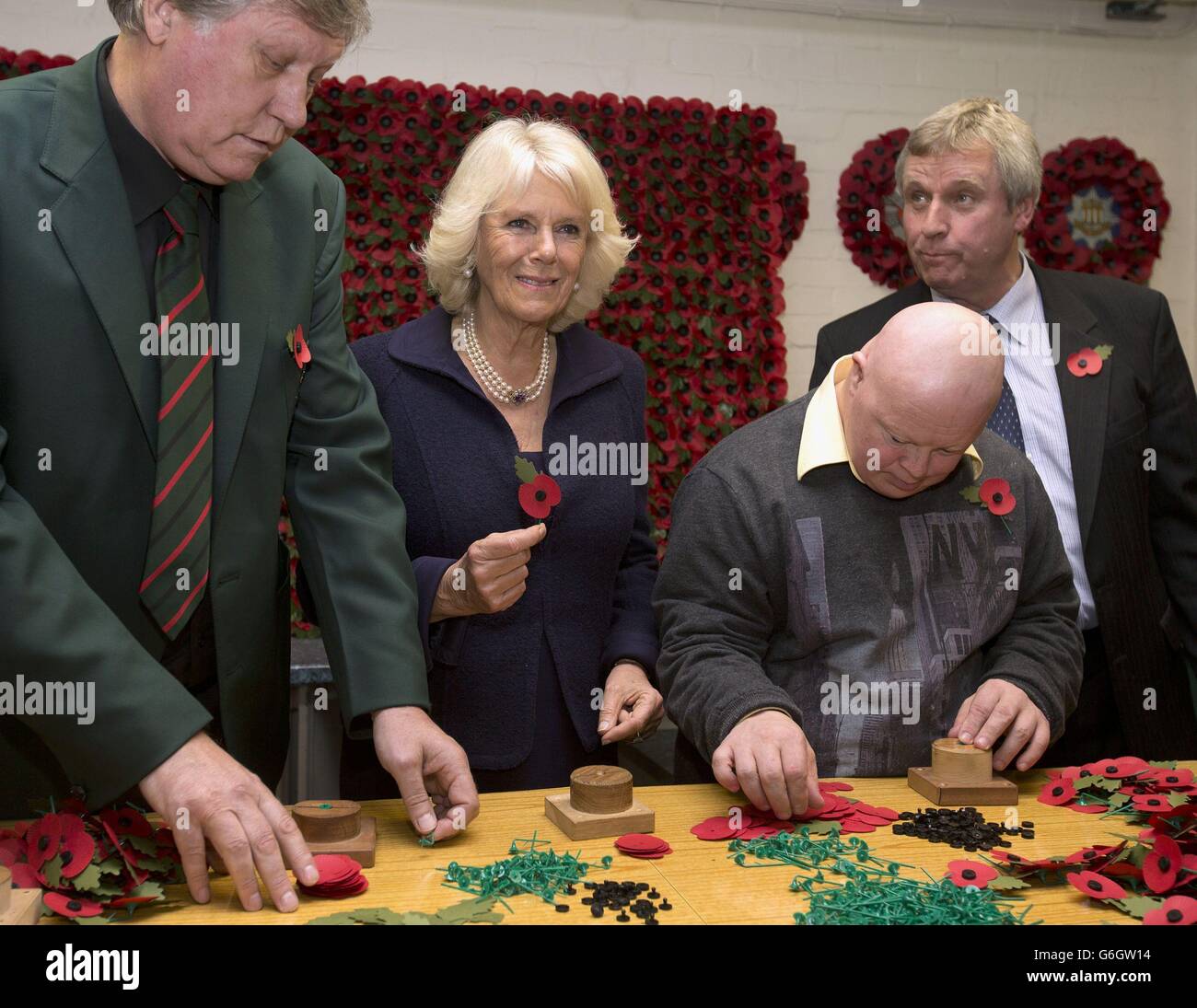 The Duchess of Cornwall displays a Remembrance Day poppy, which she ...