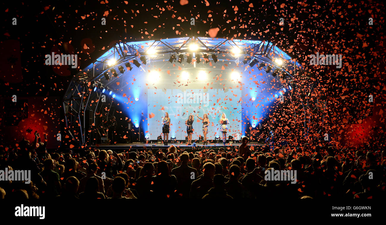The Saturdays perform as poppys fall at a concert at RAF Northolt to ...